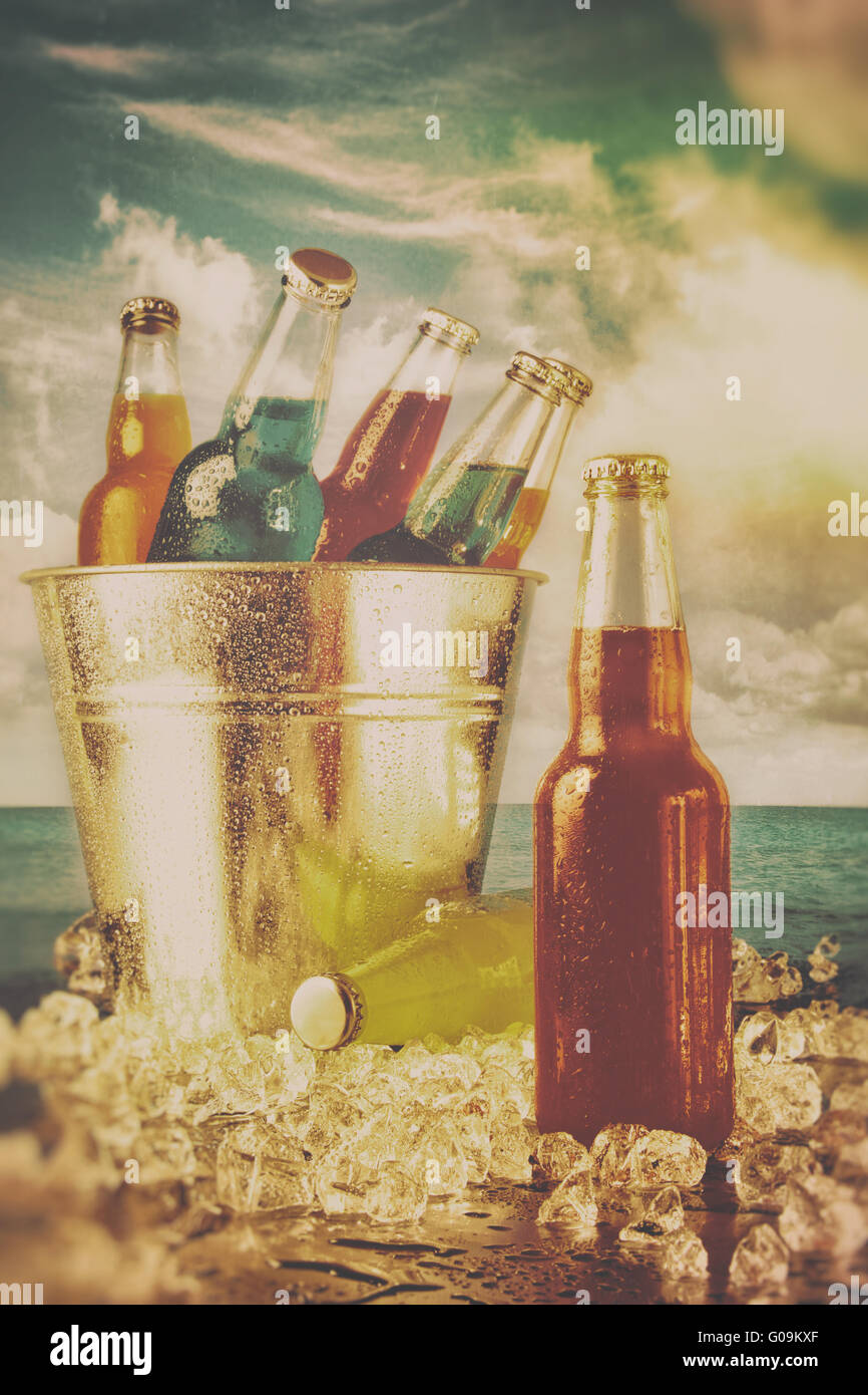 Cold summer drinks in ice bucket on the beach Stock Photo - Alamy