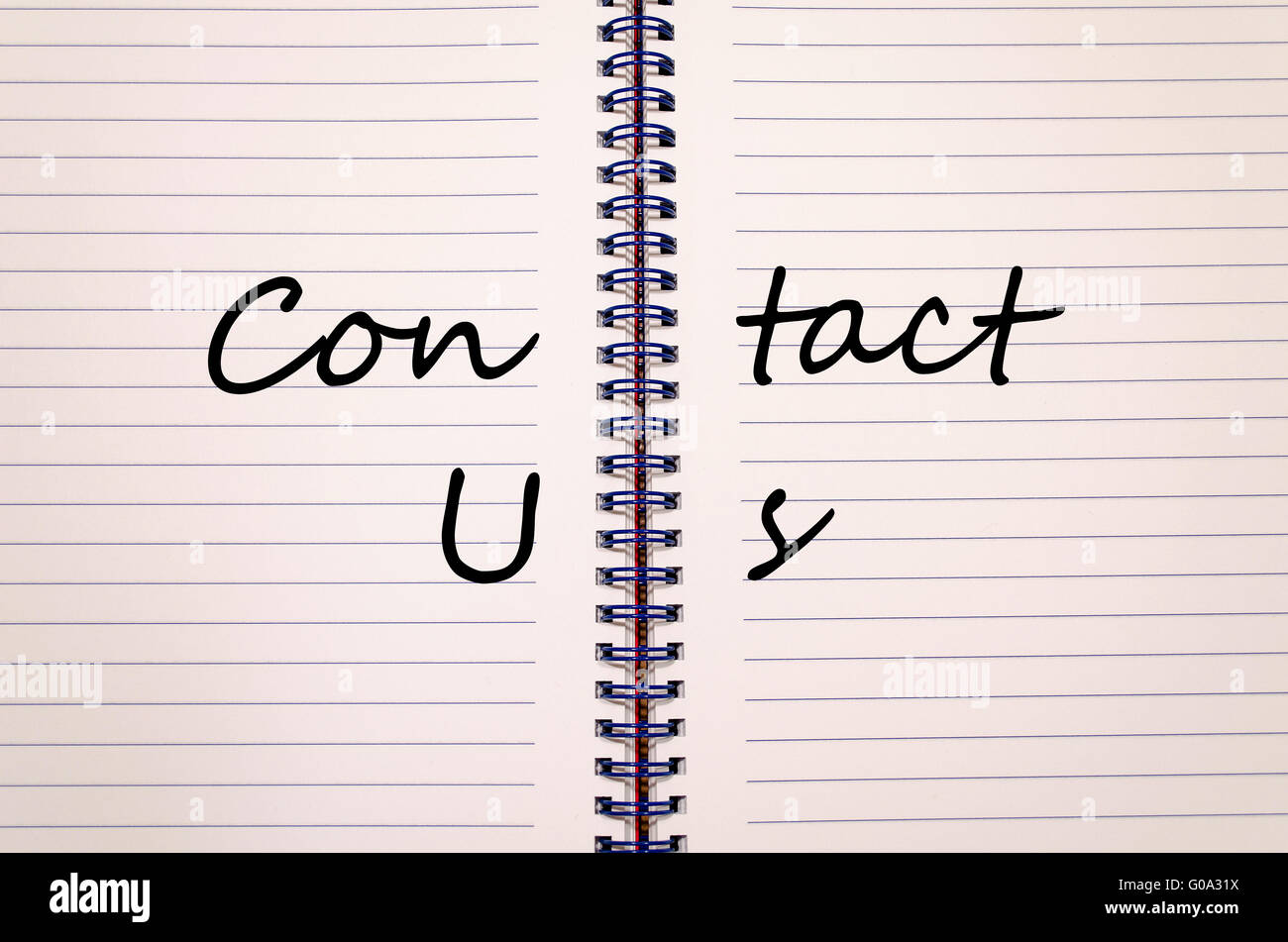 Contact us text concept write on notebook Stock Photo - Alamy