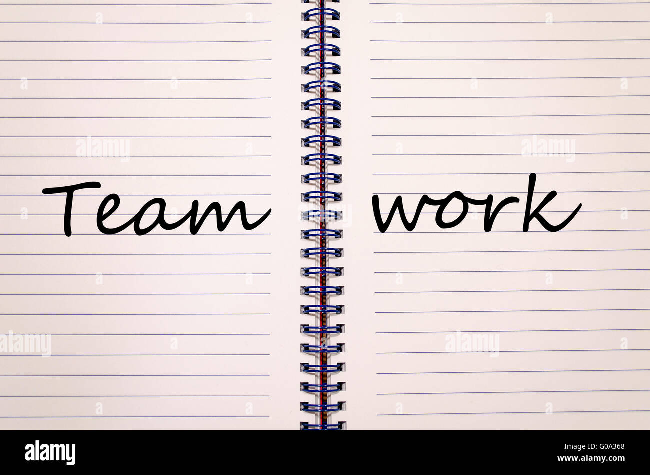 Teamwork text concept write on notebook Stock Photo - Alamy