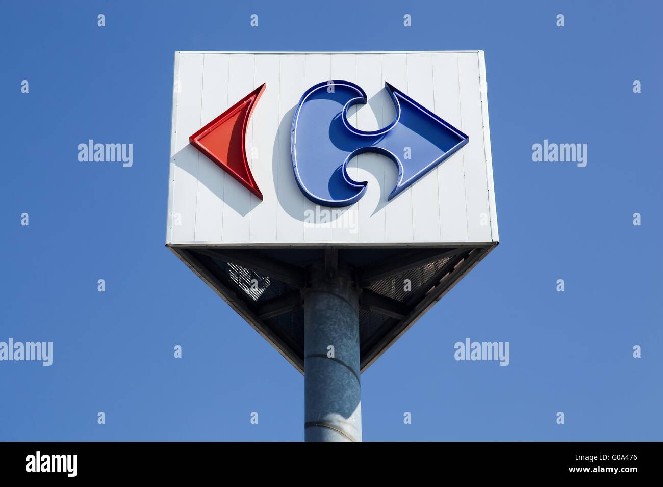 Carrefour sign on a pole Stock Photo - Alamy