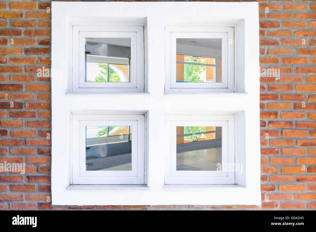 window in brick wall with view inside the interior Stock Photo - Alamy