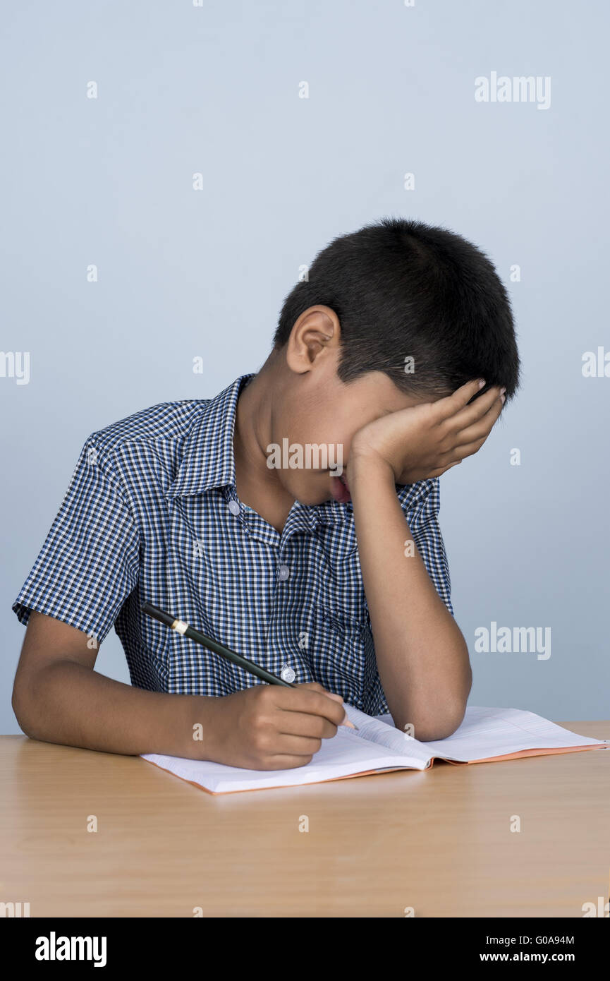 Sad indian boy hi-res stock photography and images - Alamy