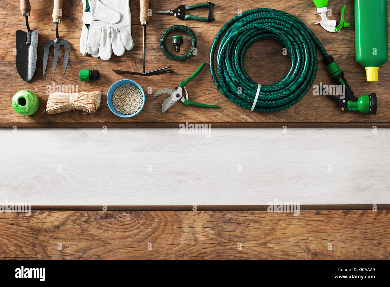 Gardening and farming tools on a wooden table and blank copy space, top ...