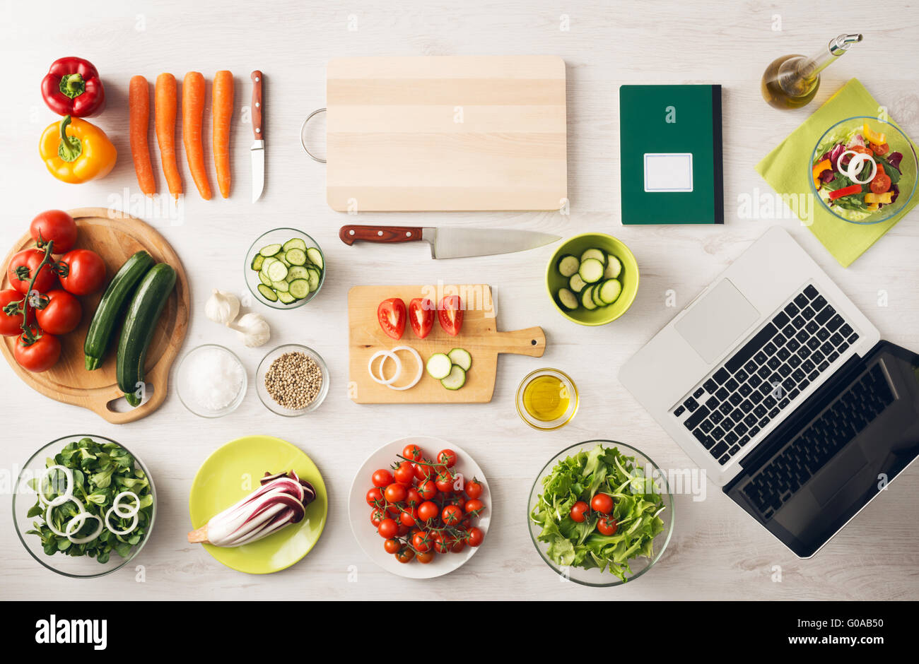 Vegetarian creative cooking at home with kitchen utensils, food ...