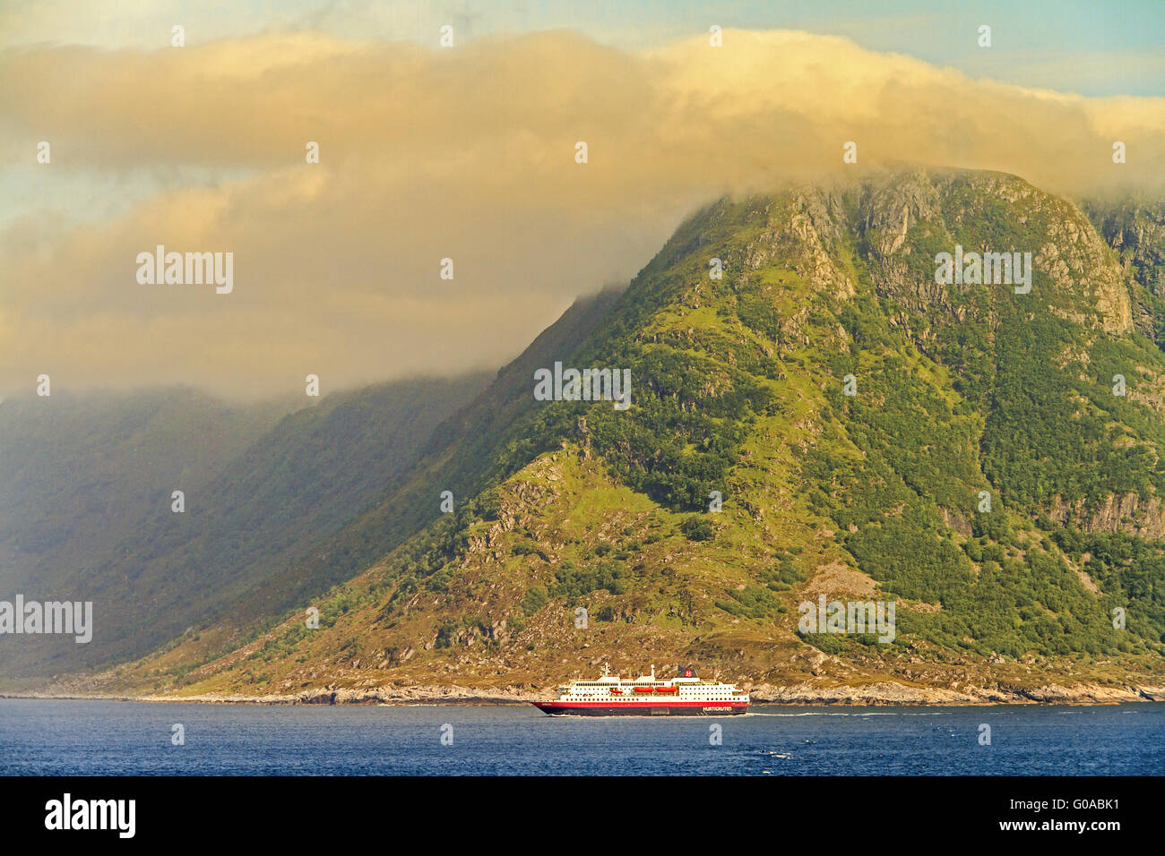 The Hurtigruten Ferry Crossing The Fjord Alesund N Stock Photo - Alamy