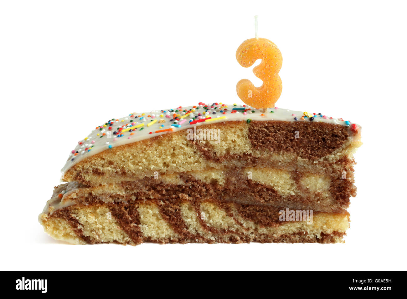 Slice of birthday cake with number three candle Stock Photo - Alamy