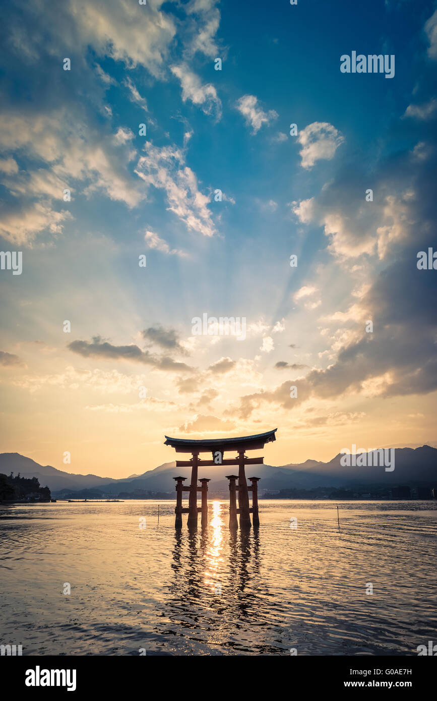 Sunset at the famous floating torii gate of the Itsukushima Shrine on ...