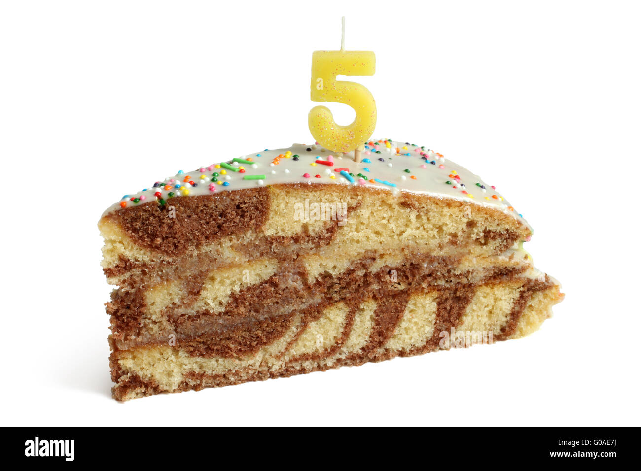 Slice of birthday cake with number five candle Stock Photo - Alamy