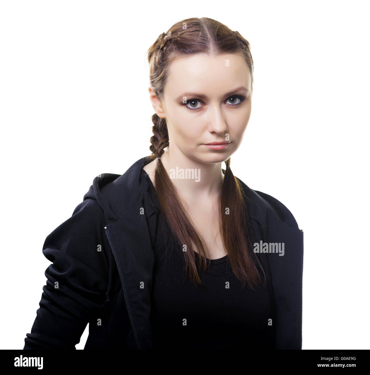 Portrait of a serious young woman on a white background Stock Photo - Alamy