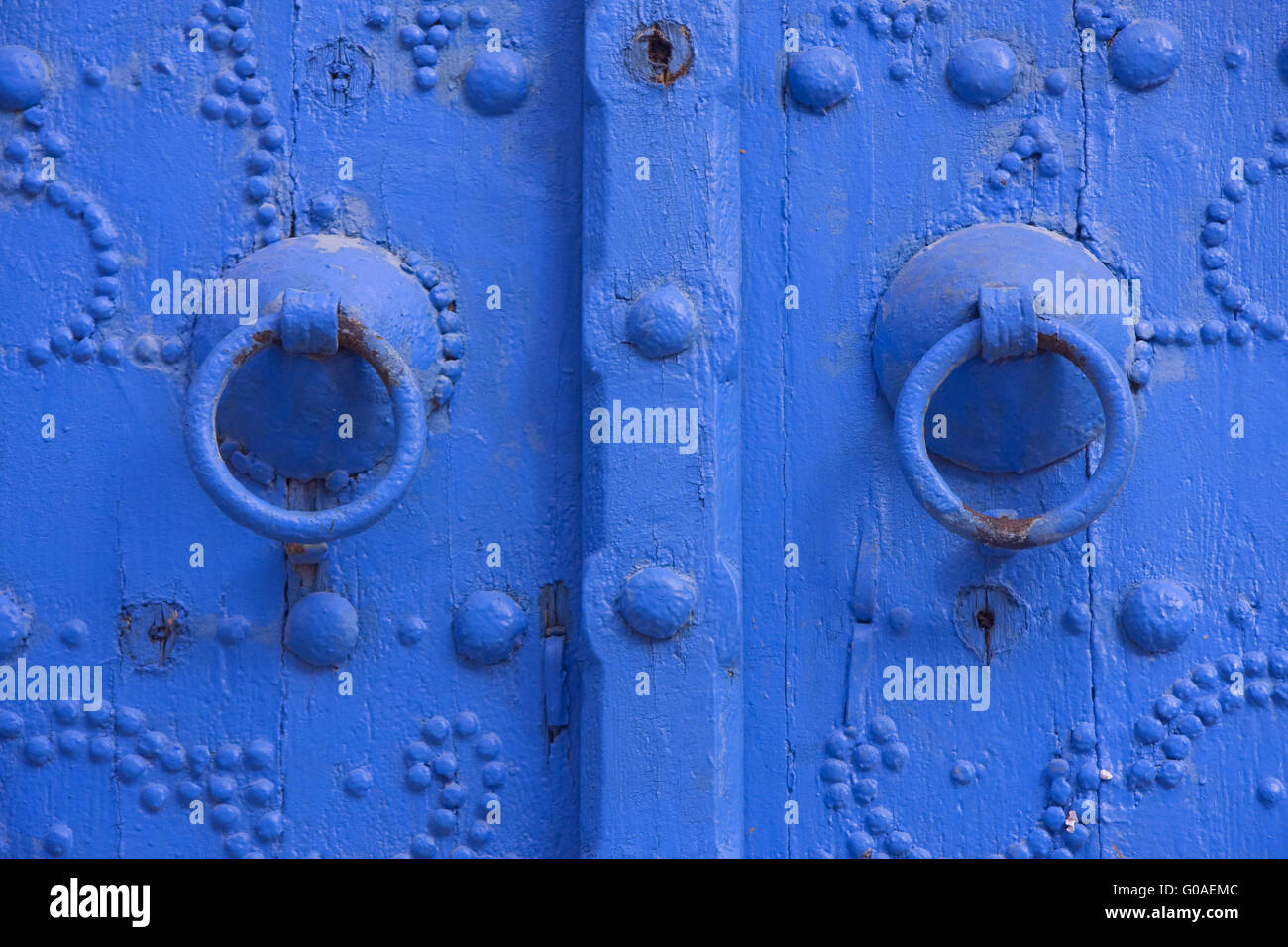Oriental beautiful blue knocker and traditional do Stock Photo - Alamy