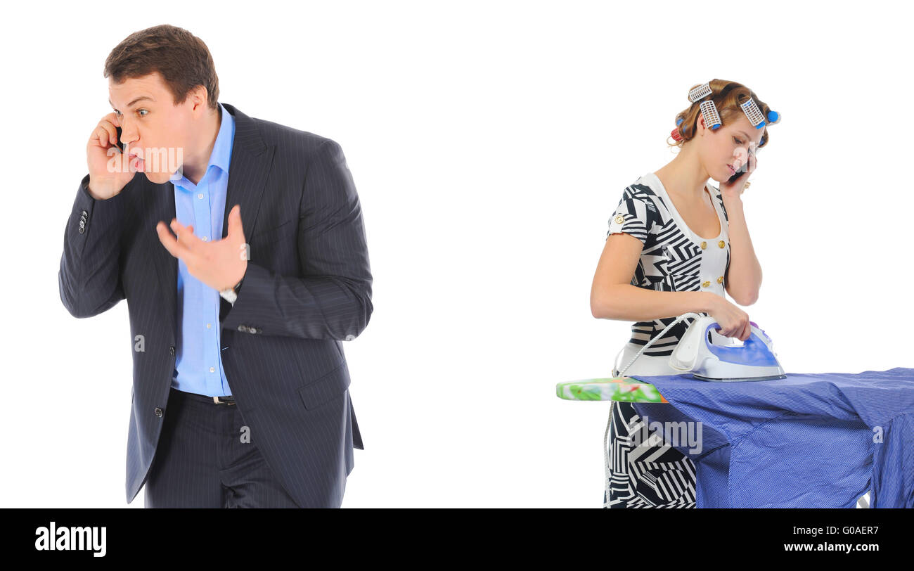 Couple is arguing while talking over the telephone Stock Photo - Alamy