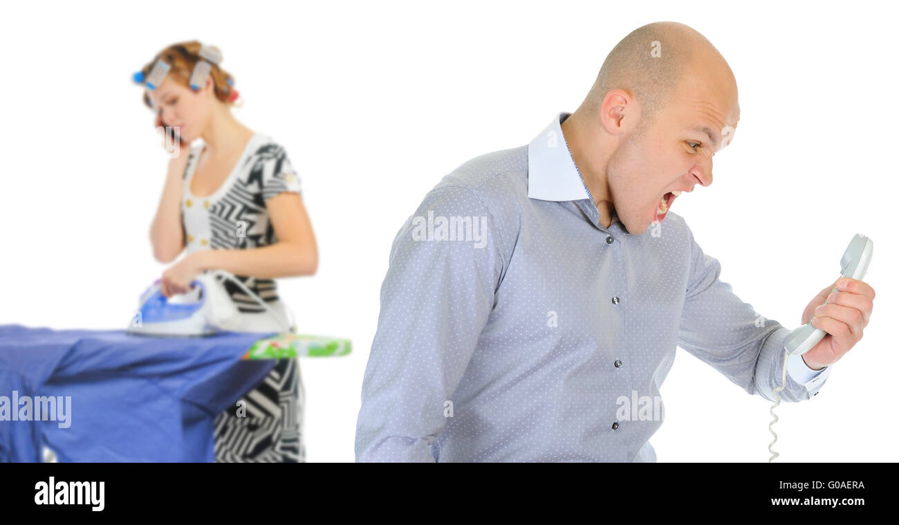 Couple is arguing while talking over the telephone Stock Photo - Alamy