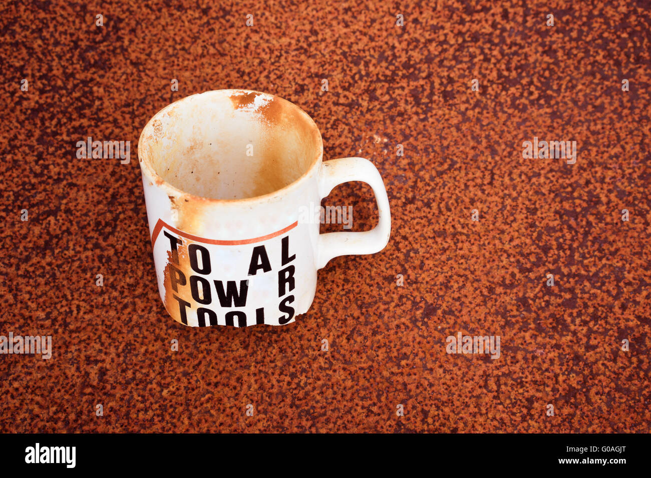 Stained Single White Cup Buried Stock Photo - Alamy