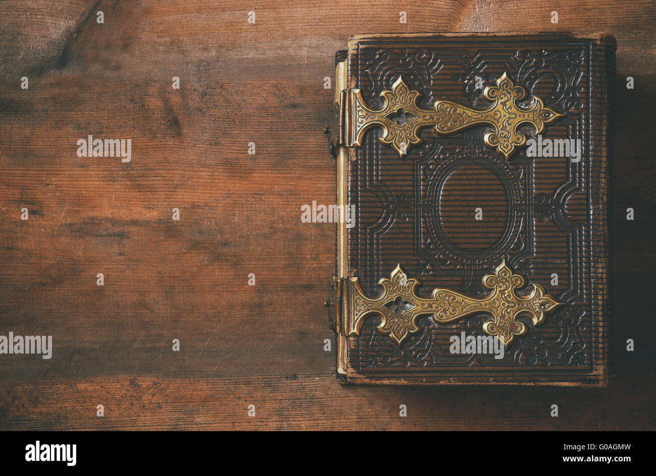 top view of antique book cover, with brass clasps. vintage filtered ...
