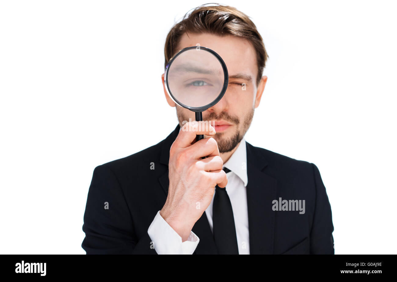 Looking through a magnifying glass hi-res stock photography and images ...