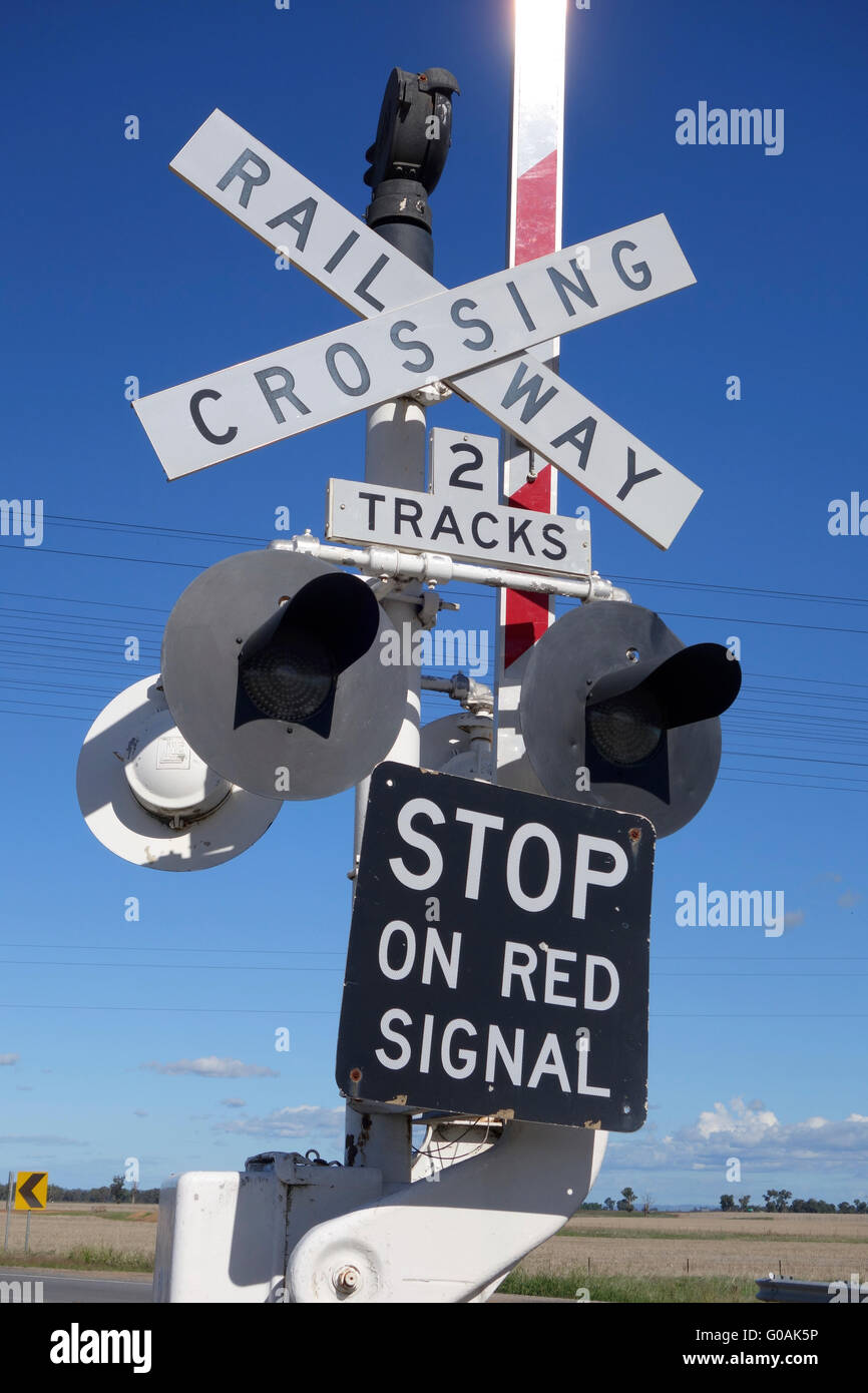 Rail way crossing stop sign warning Stock Photo - Alamy