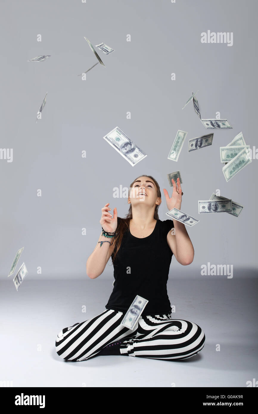 Teen girl and money Stock Photo - Alamy
