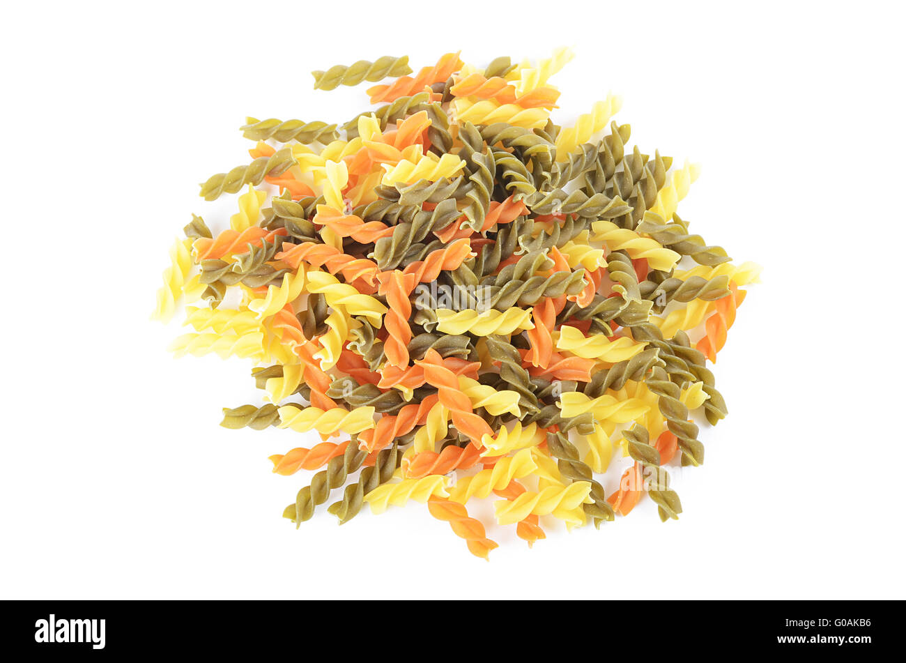 Raw colored pasta fusilli isolated on white background Stock Photo - Alamy