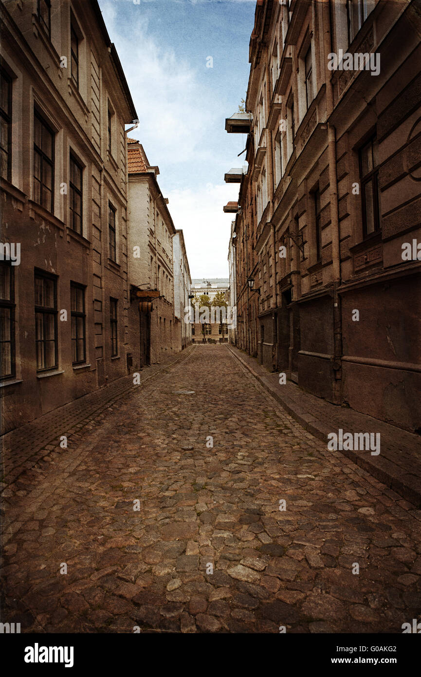 Vintage style photo of old European town street Stock Photo - Alamy