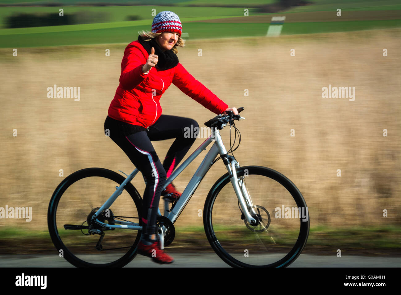 Cyclist in motion Stock Photo - Alamy