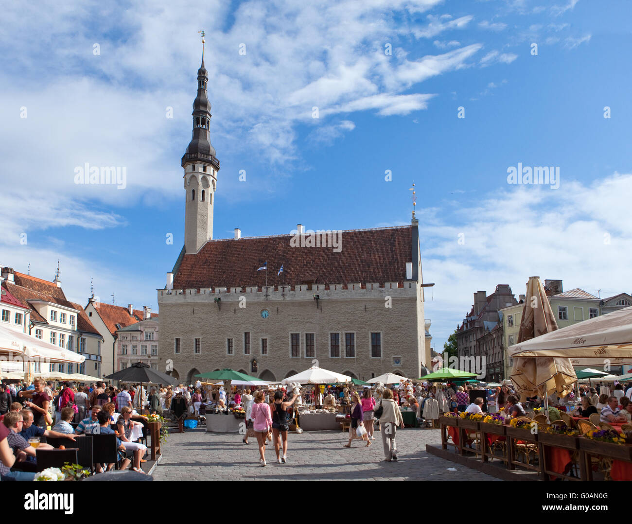 A crowd of tourists visit Town hall square in exh Stock Photo - Alamy