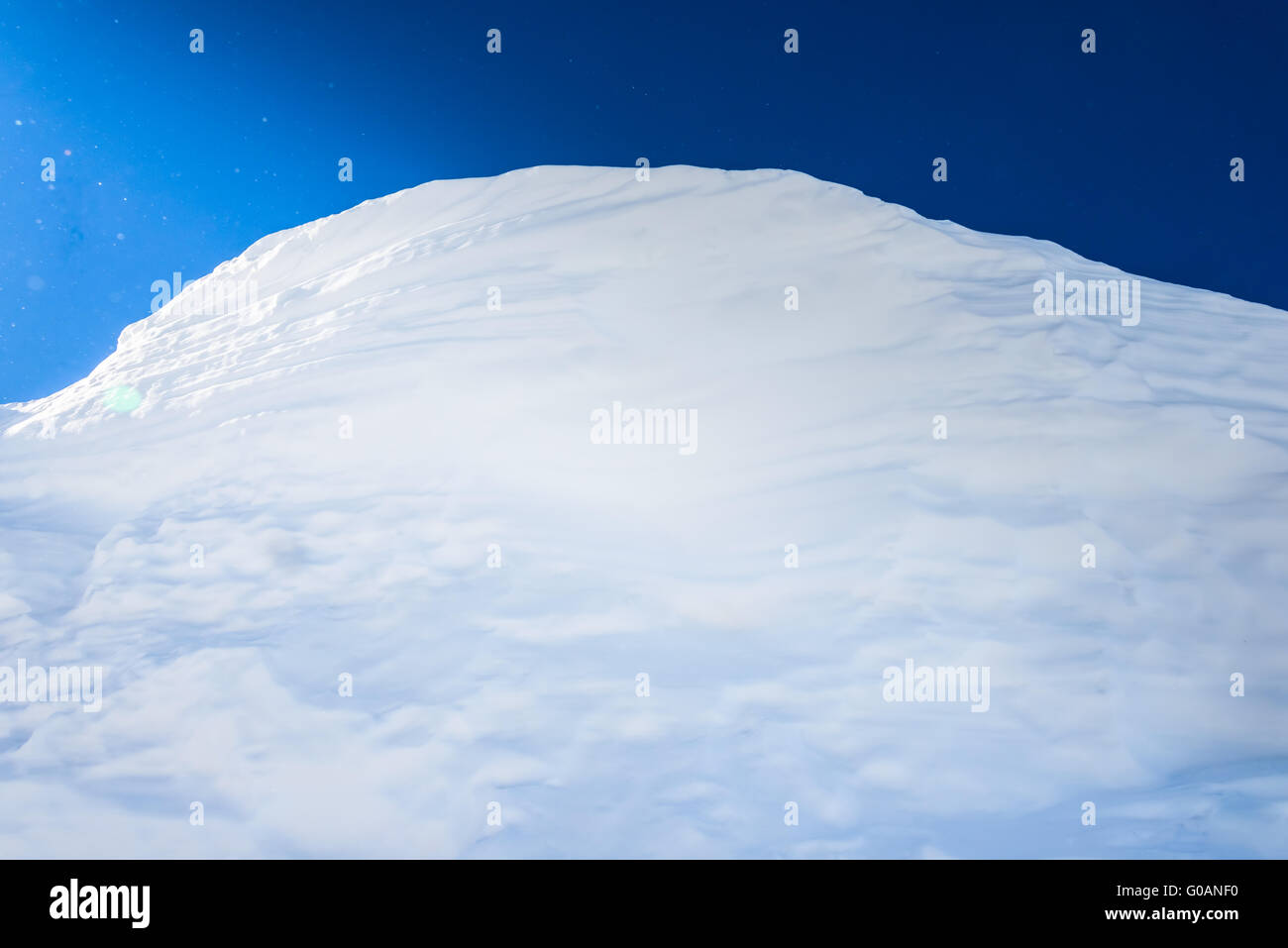 big snow hummock of pure white snow made wind Stock Photo - Alamy