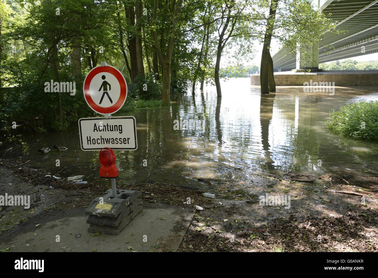 Caution High Water, german sign with red warning Stock Photo - Alamy