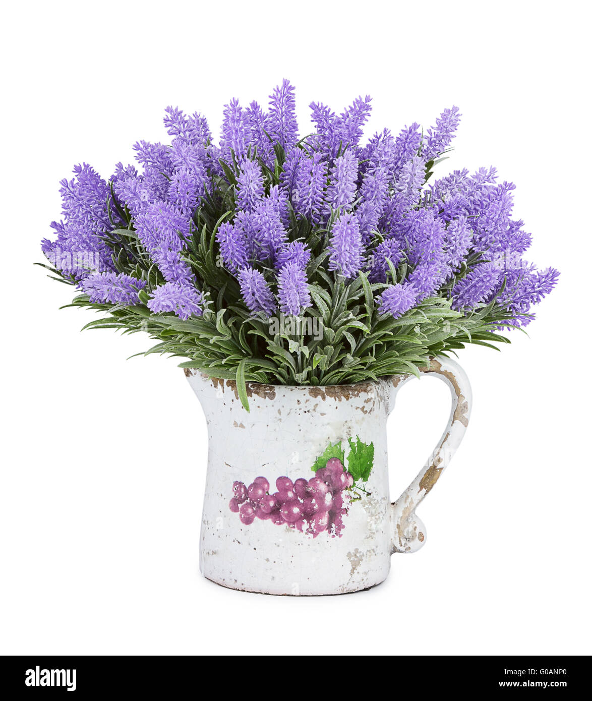 Jug with wild flowers isolated on white background Stock Photo - Alamy