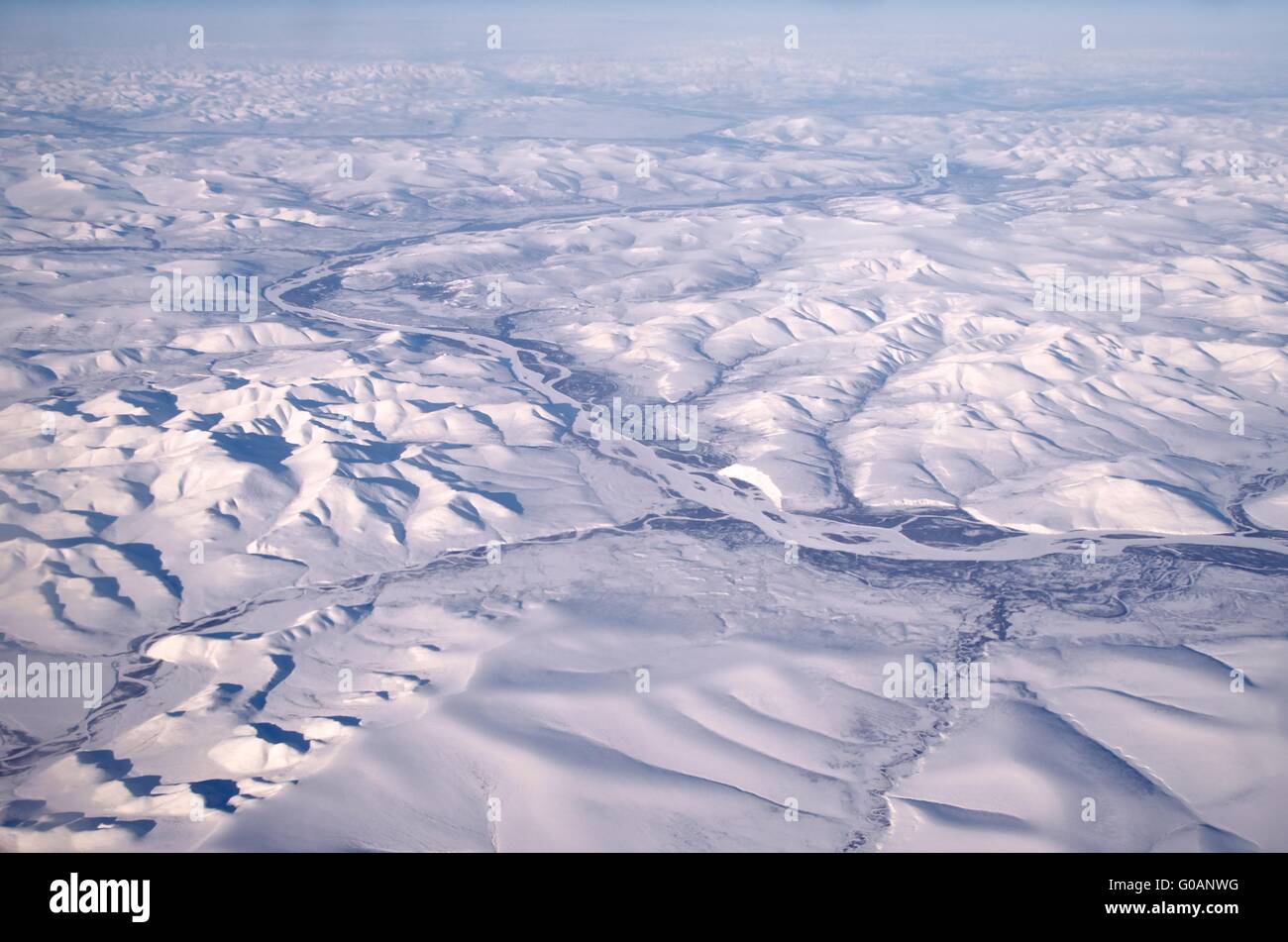 A Frozen River Running Through Ice And Snow In Ala Stock Photo - Alamy