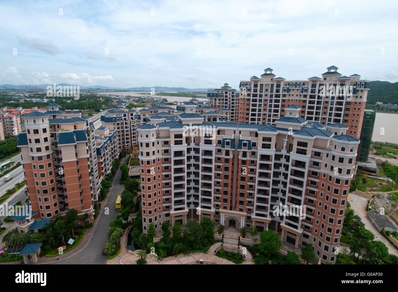 Perspective view of Modern and new apartment building Stock Photo - Alamy