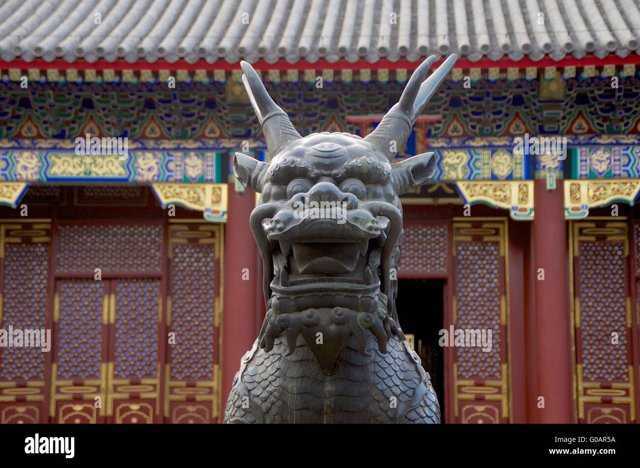 A Statue Of A Qilin Standing Before The Summer Pal Stock Photo - Alamy