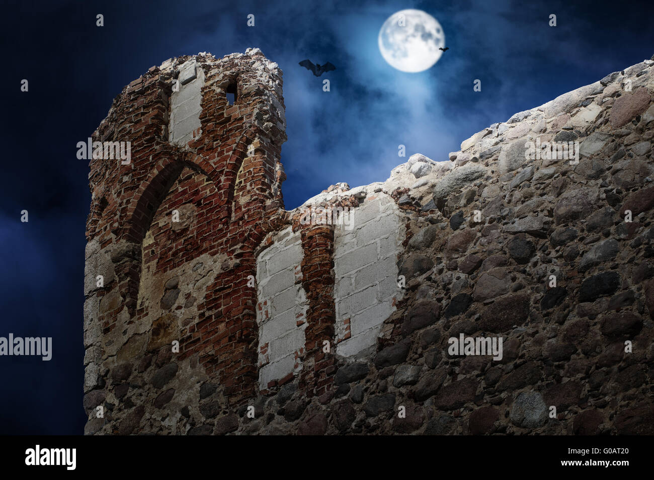 Full moon over the old castle ruins Stock Photo - Alamy