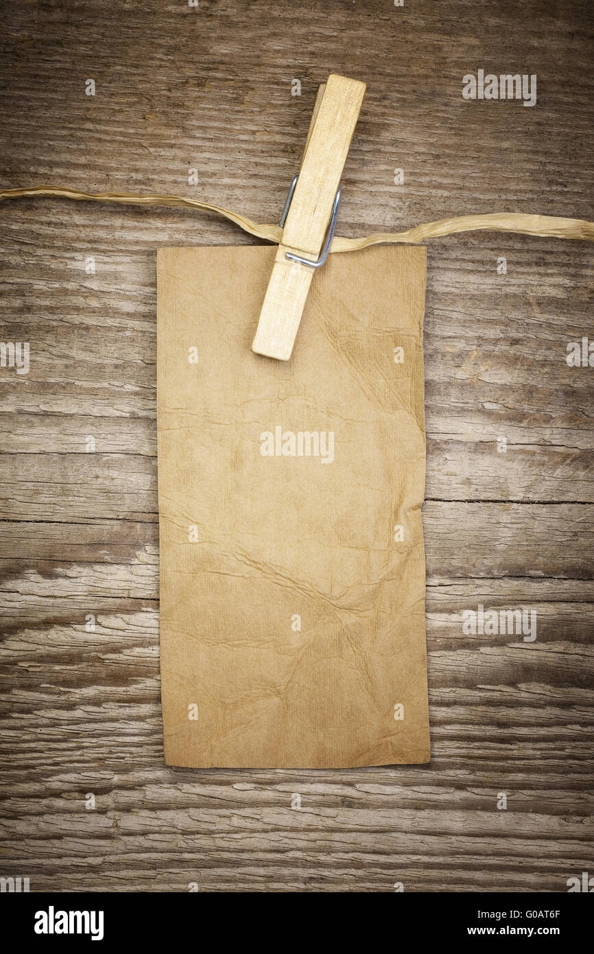 Old paper note on a wooden boards Stock Photo - Alamy
