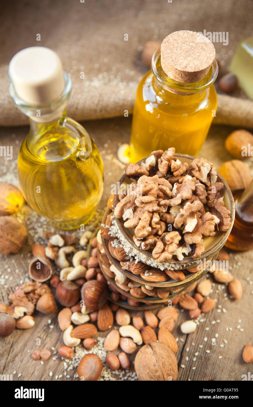 oil and mixed nuts Stock Photo - Alamy