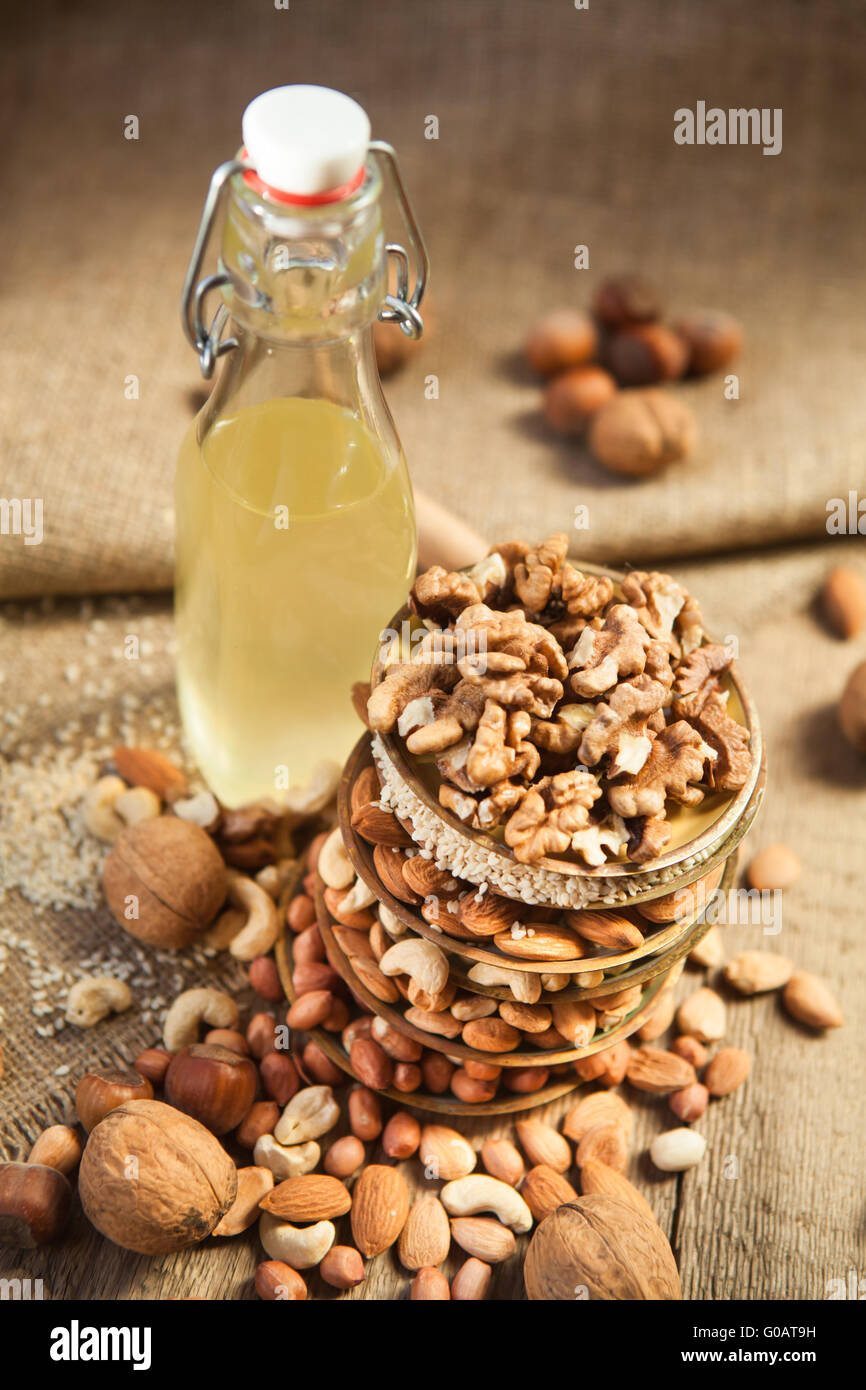 oil and mixed nuts Stock Photo - Alamy