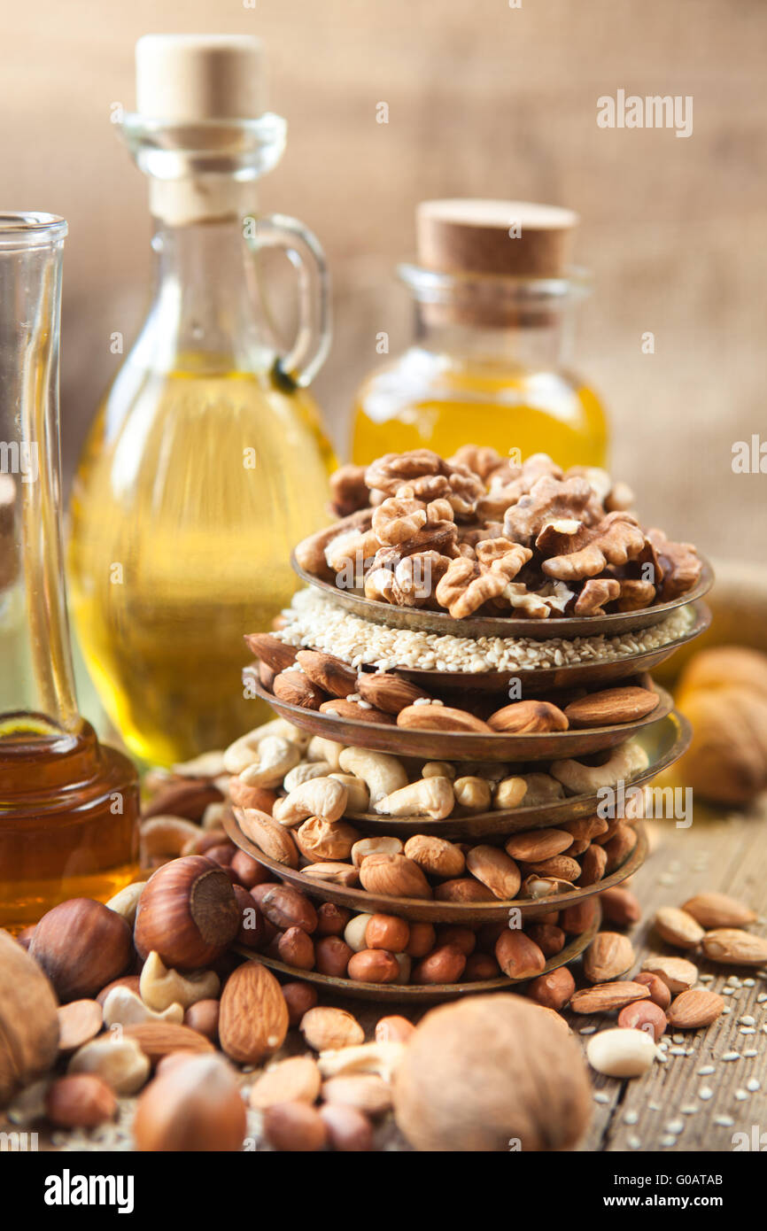 oil and mixed nuts Stock Photo - Alamy