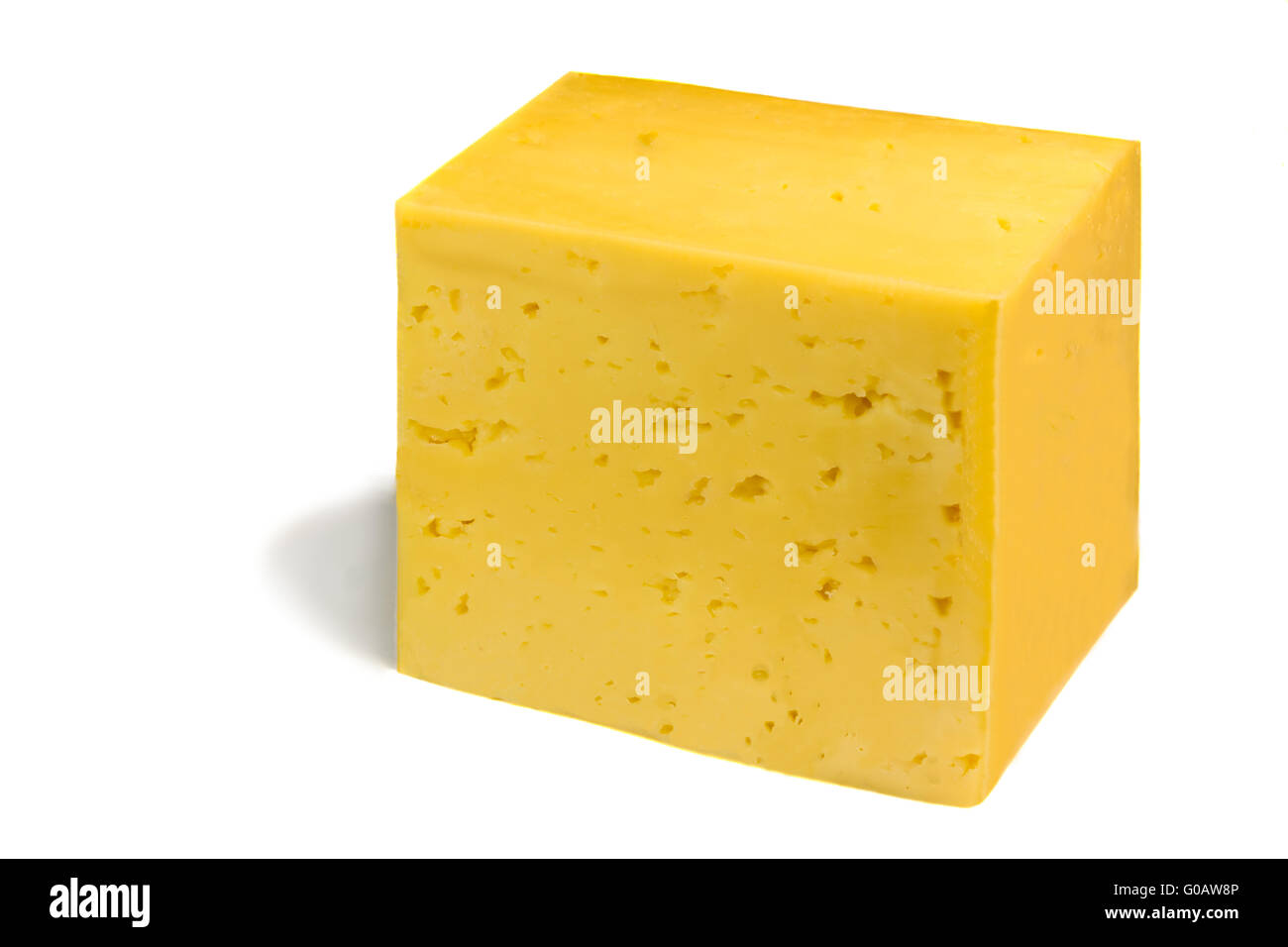 Big piece of cheese on a white background Stock Photo - Alamy