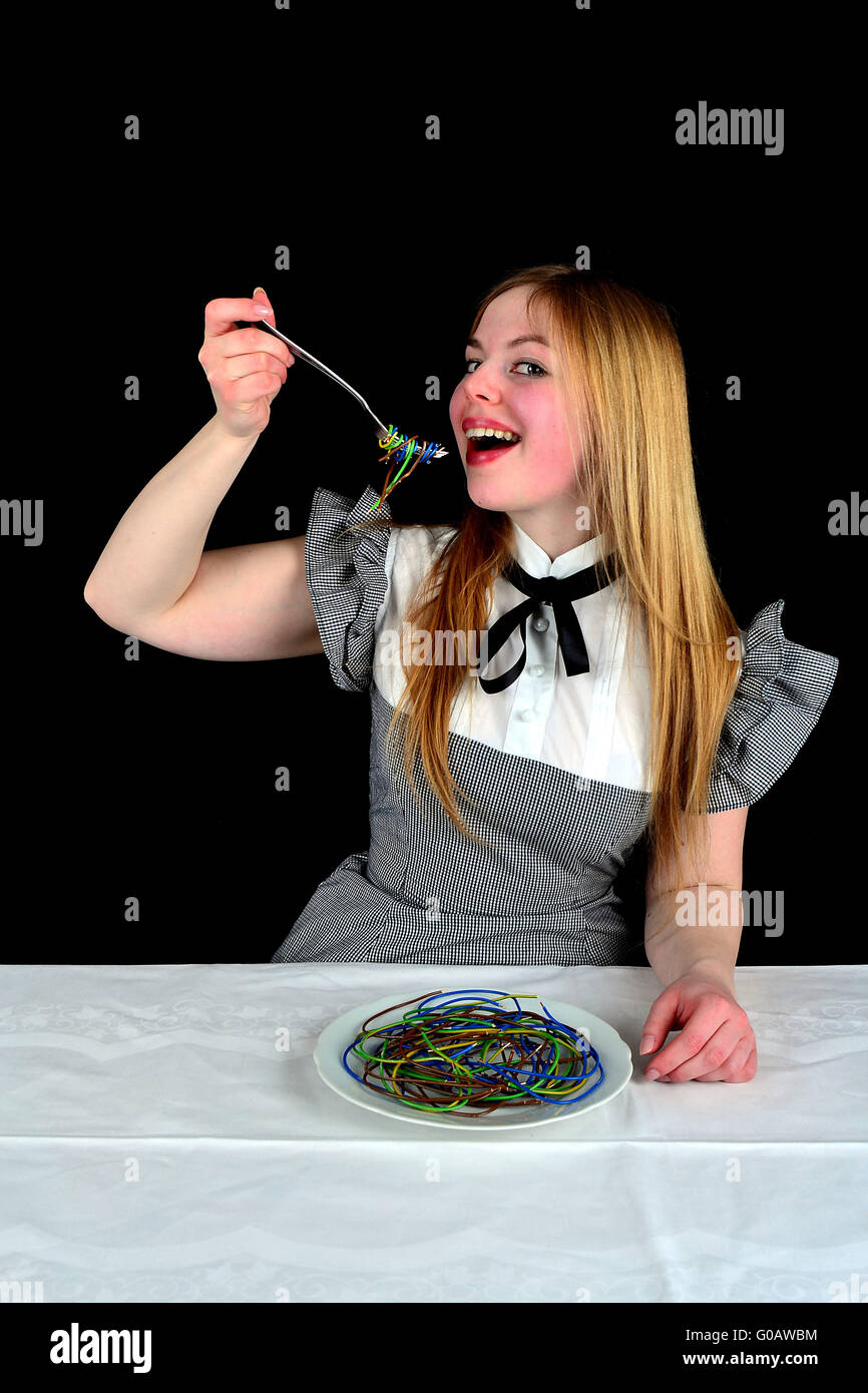 Young woman eating cable hi-res stock photography and images - Alamy