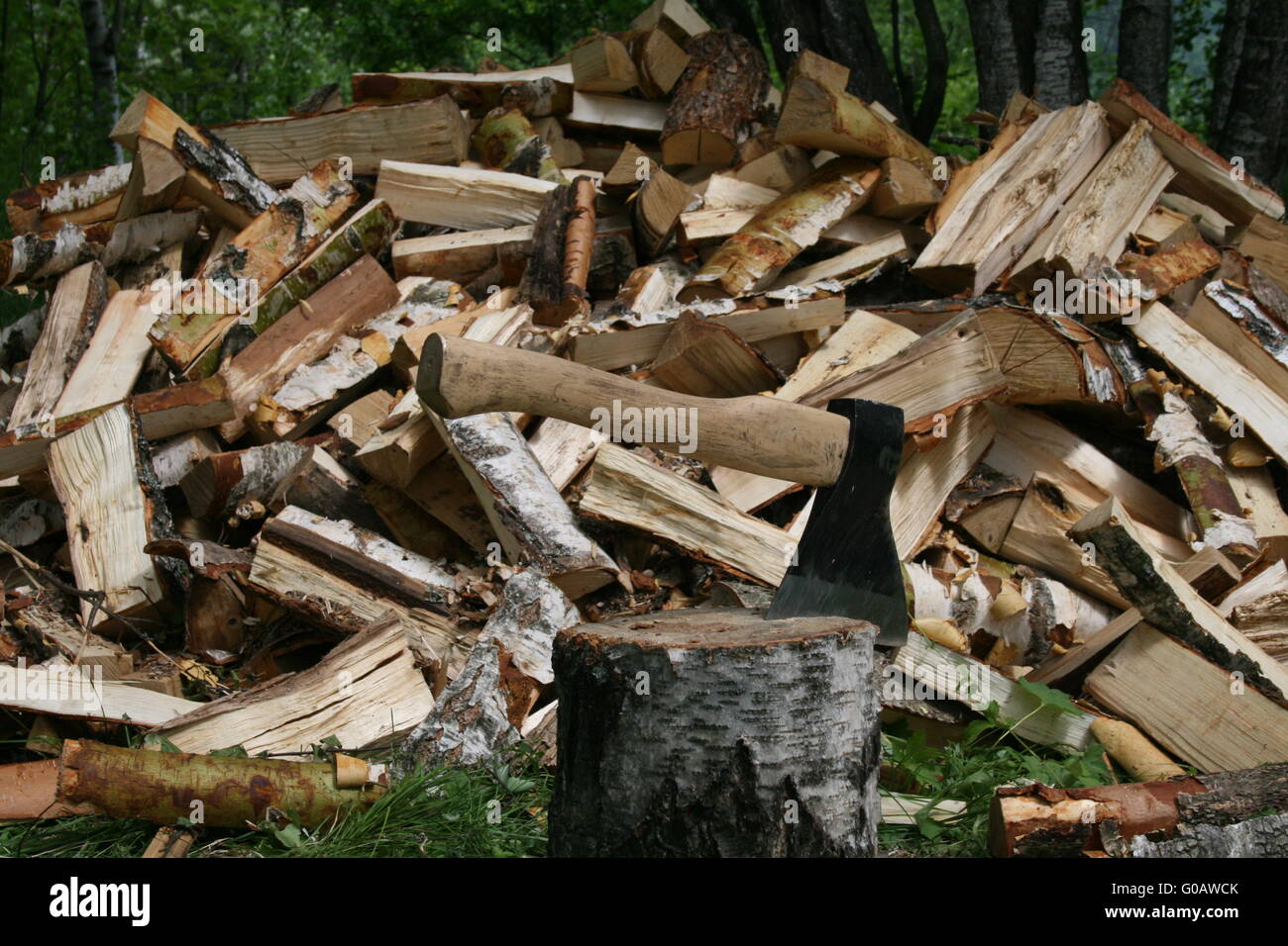 Pile of logs axe hi-res stock photography and images - Alamy