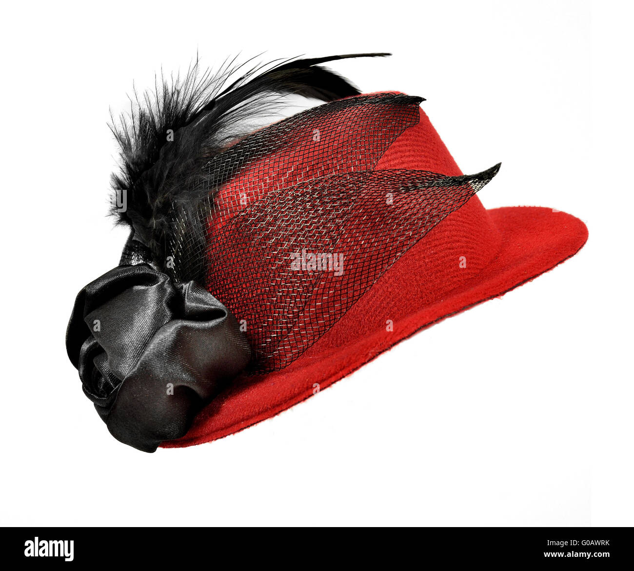 Vintage red lady's hat with black feathers Stock Photo - Alamy