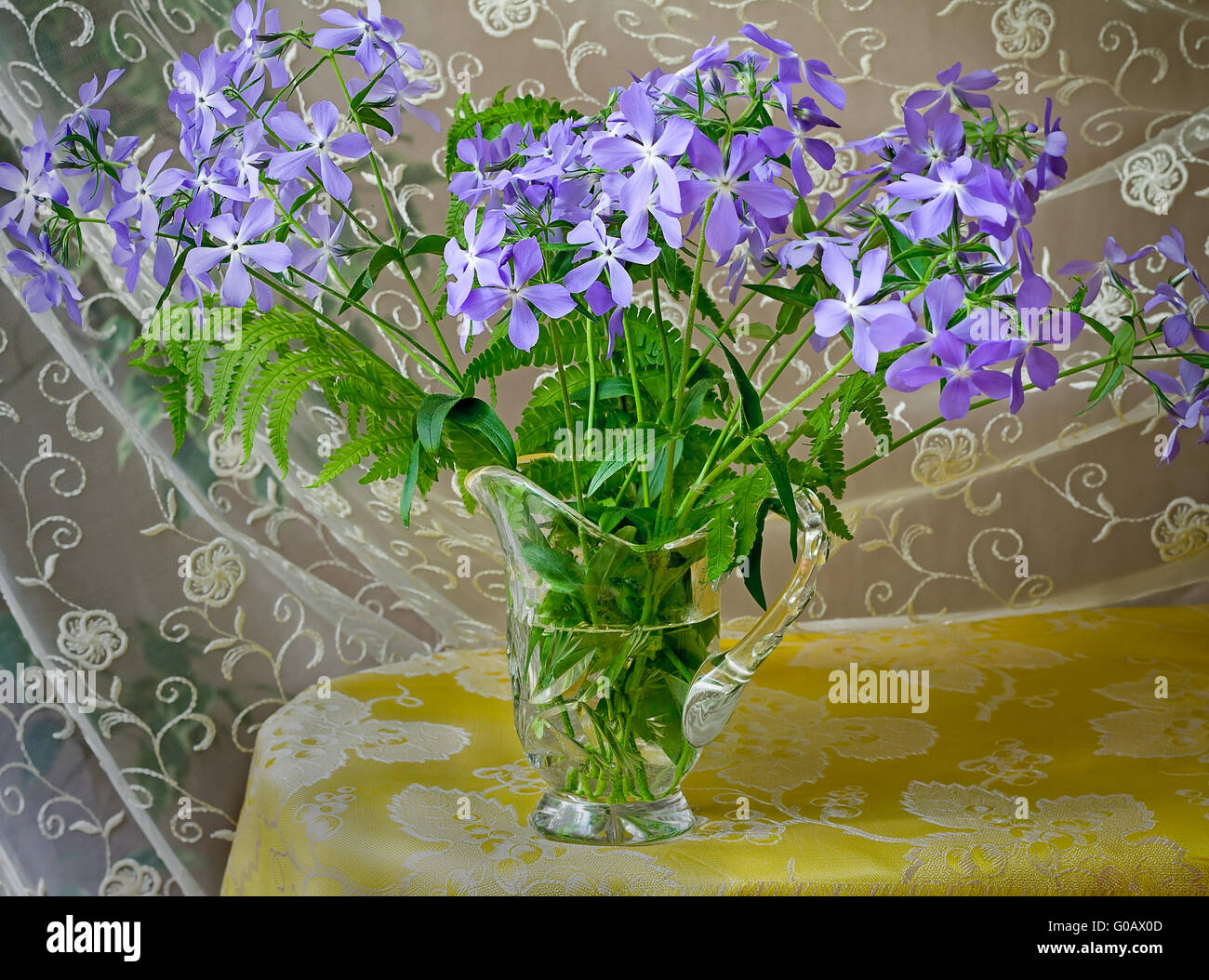Violets in vase hi-res stock photography and images - Alamy