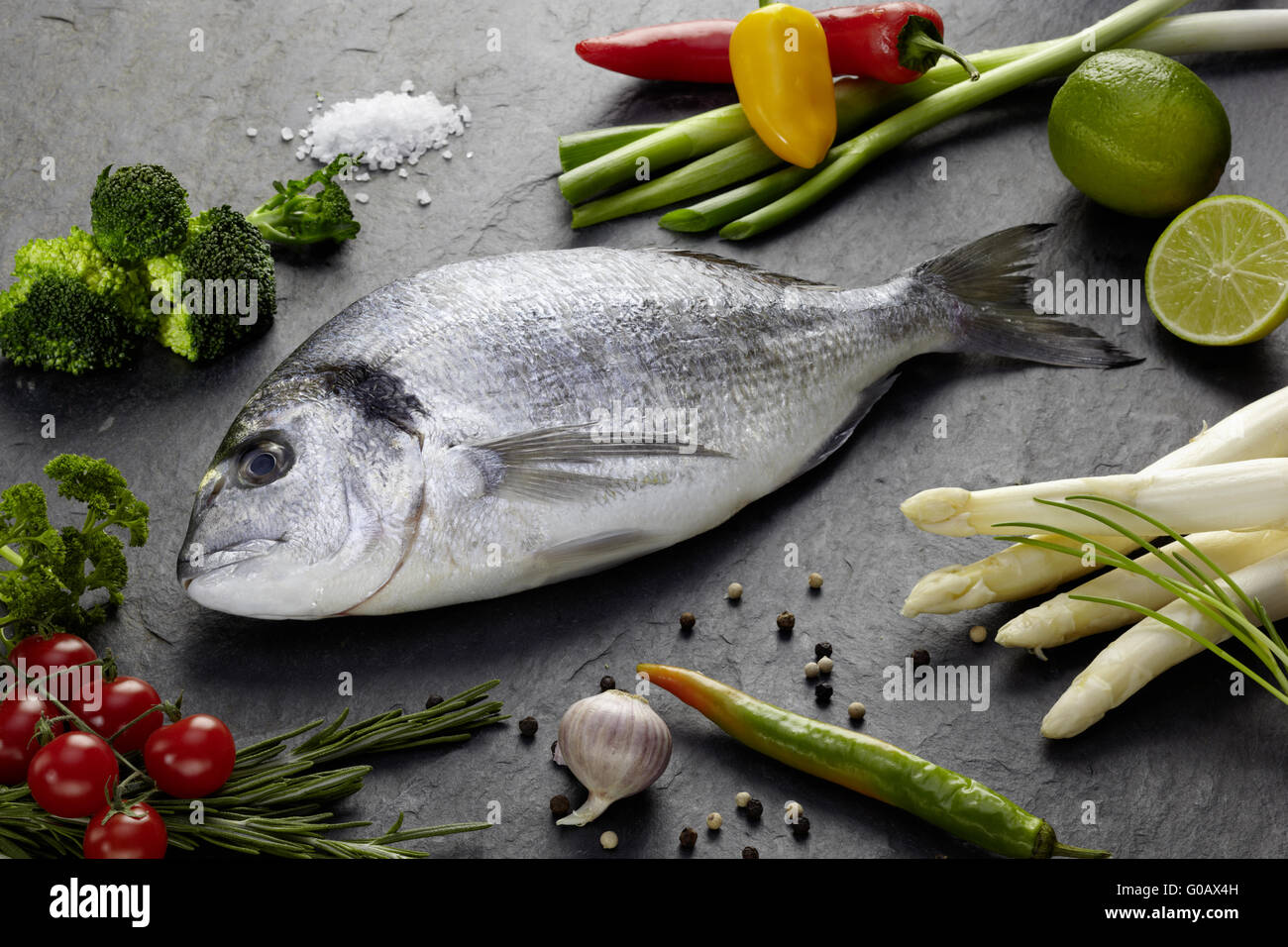 Fish with Vegetables Stock Photo - Alamy