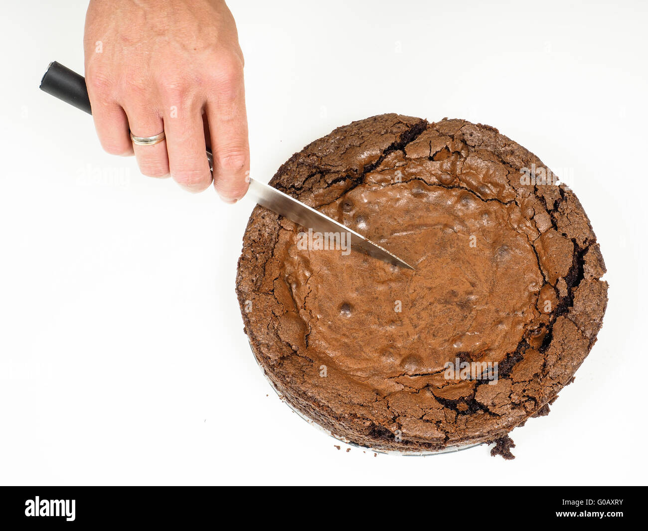 Cutting chocolate cake Stock Photo - Alamy