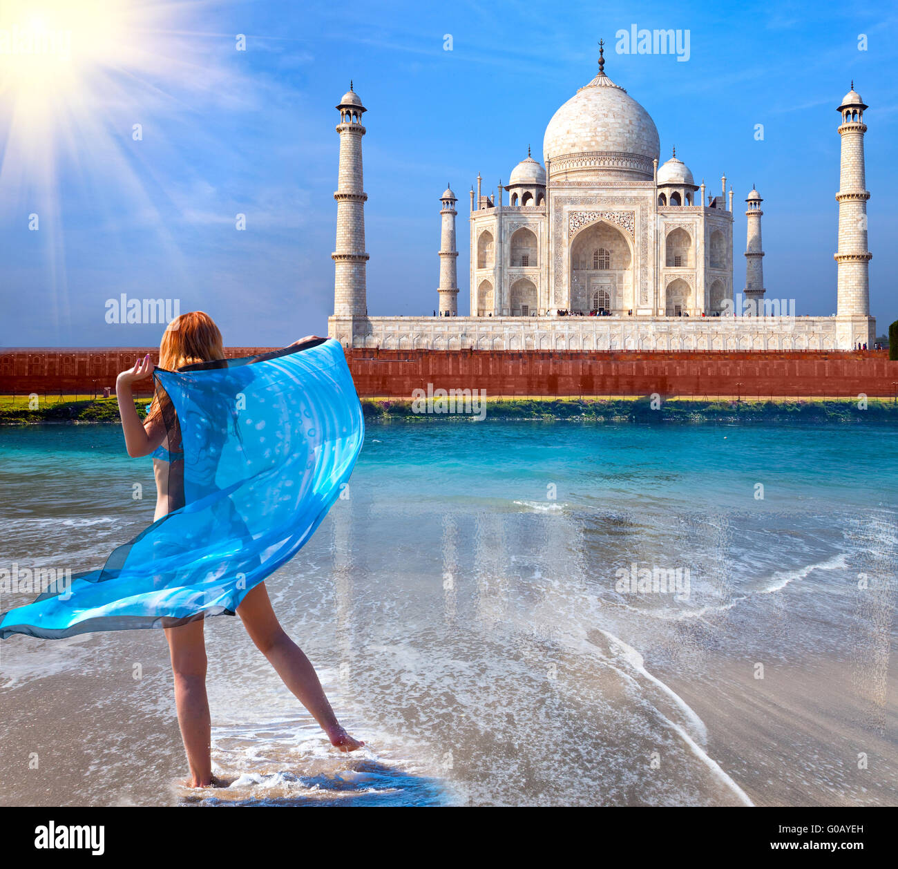 young woman in a fluttering cape see on Taj Mahal Stock Photo - Alamy