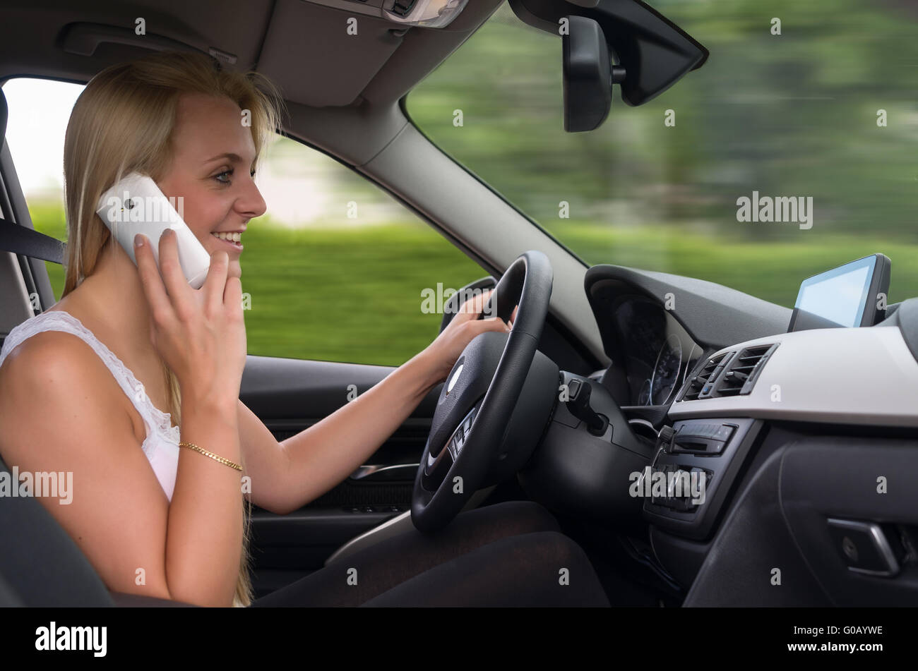 Calling while Driving 11 Stock Photo - Alamy