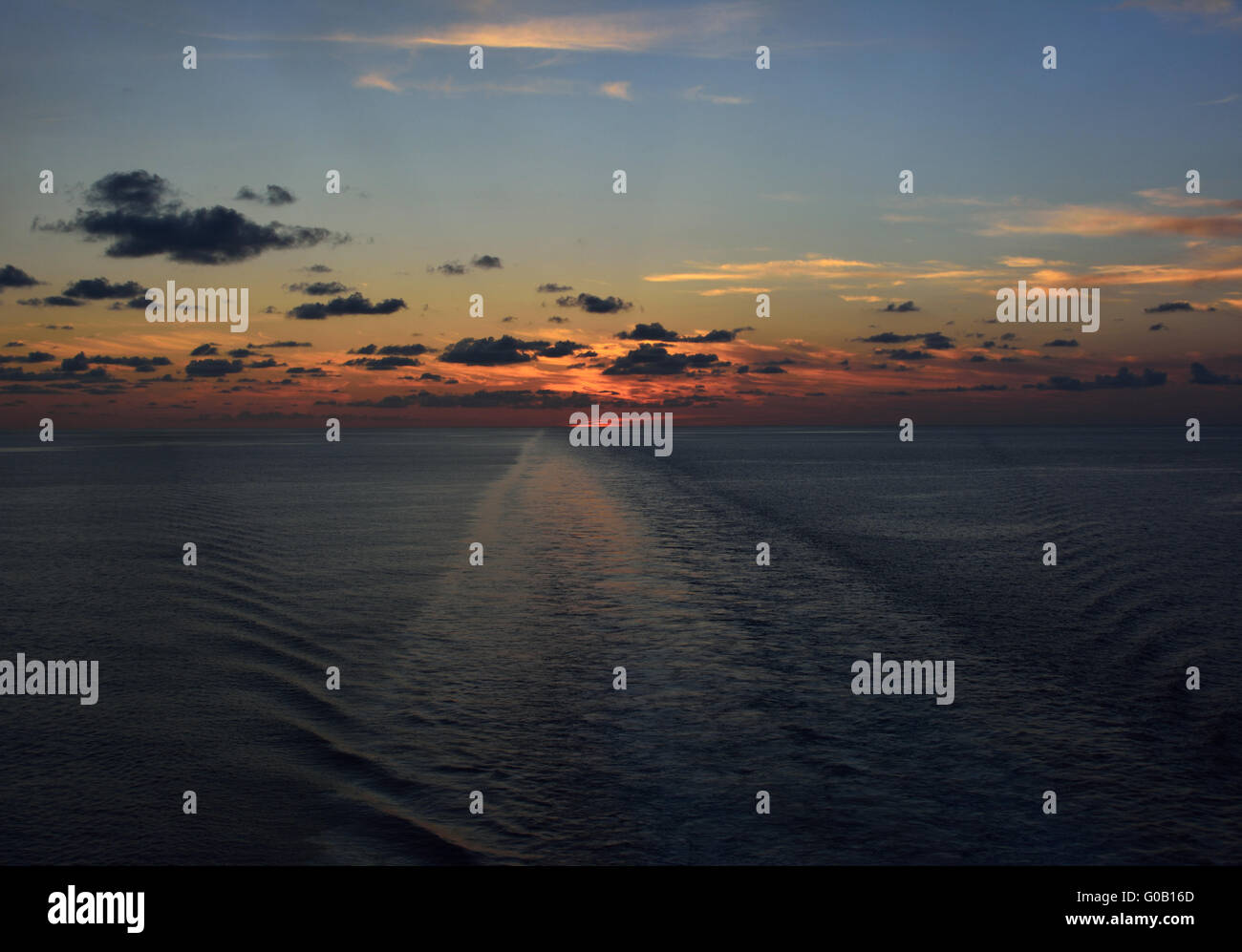 Wake and sunset Stock Photo - Alamy