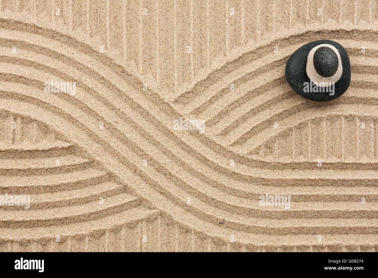 Pyramid made of stones standing on the strip sand, as background Stock ...