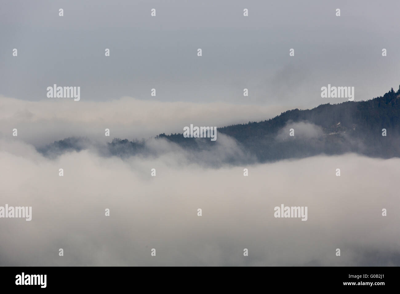 Mist in valley Stock Photo - Alamy