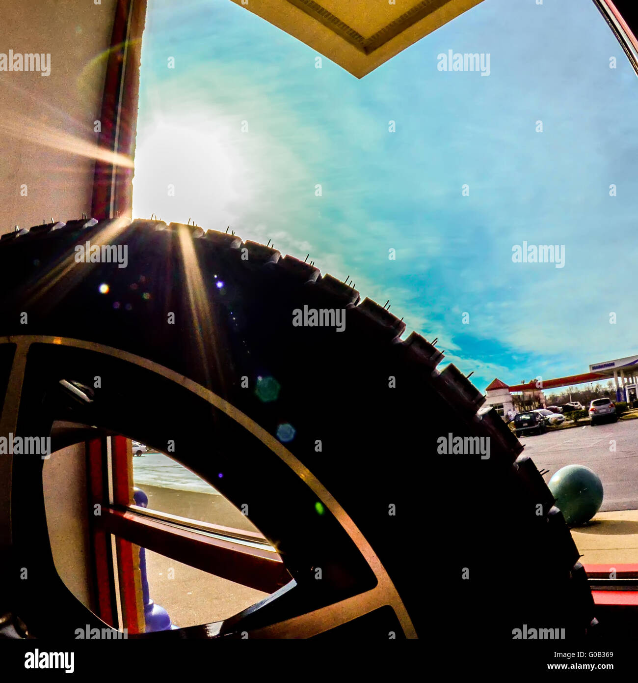 car tires on display for sale at a tire shop store Stock Photo - Alamy