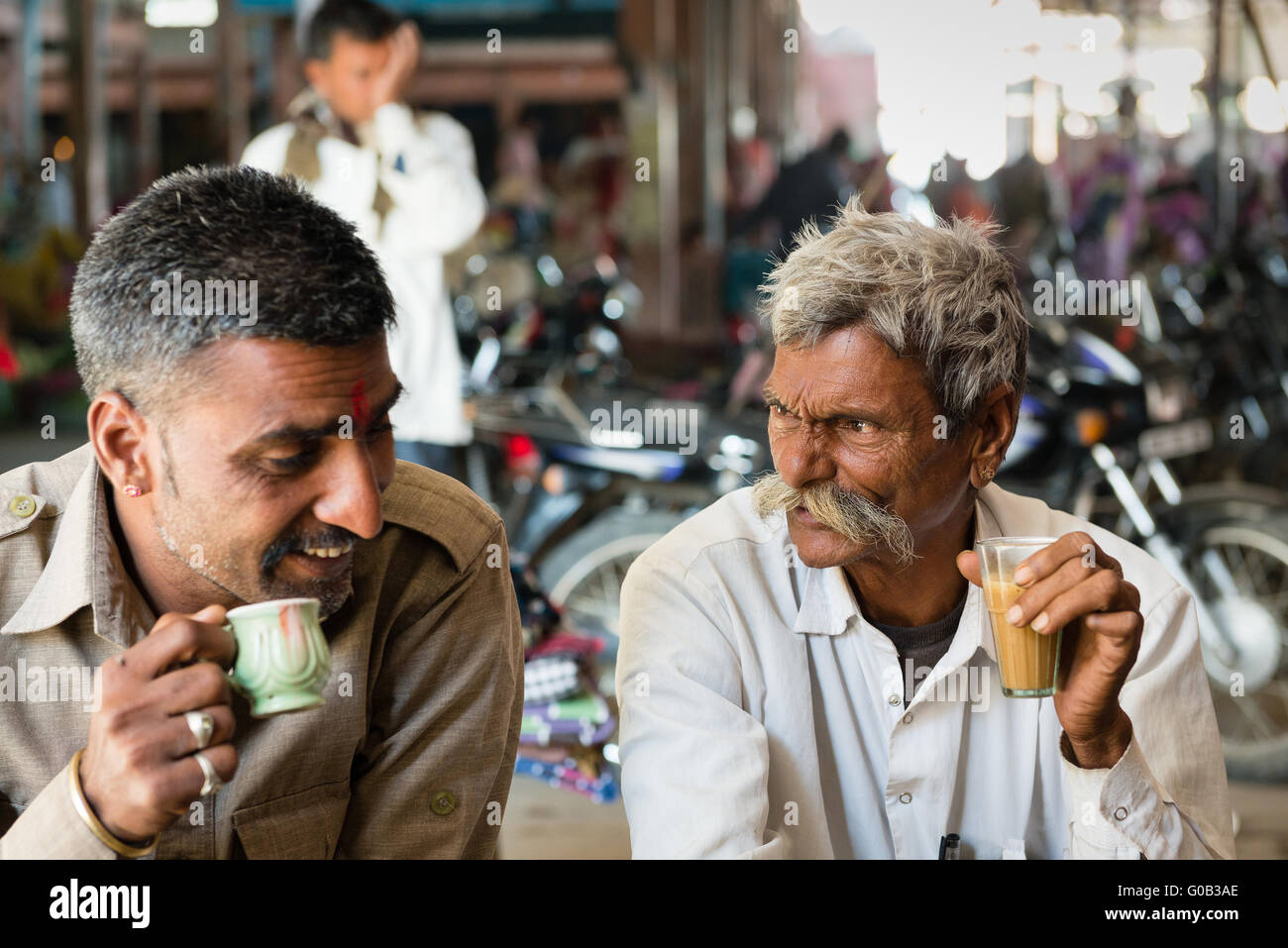 Portrait of indian man drinking chai hi-res stock photography and ...